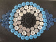 Evil eye button art work with vintage buttons on canvas