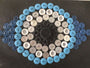 Evil eye button art work with vintage buttons on canvas
